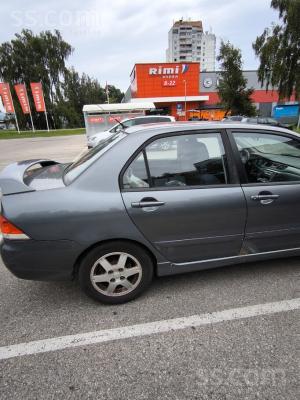 Grey Mitsubishi Lancer 2006 in Riga, with an engine capacity of 1.60 L and mileage of 160 thousand km for 700 €, photo 6 on AUTOMOTO.COM.LV