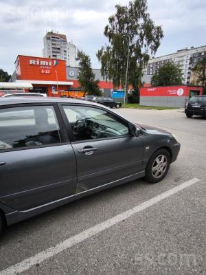 Grey Mitsubishi Lancer 2006 in Riga, with an engine capacity of 1.60 L and mileage of 160 thousand km for 700 €, photo 7 on AUTOMOTO.COM.LV