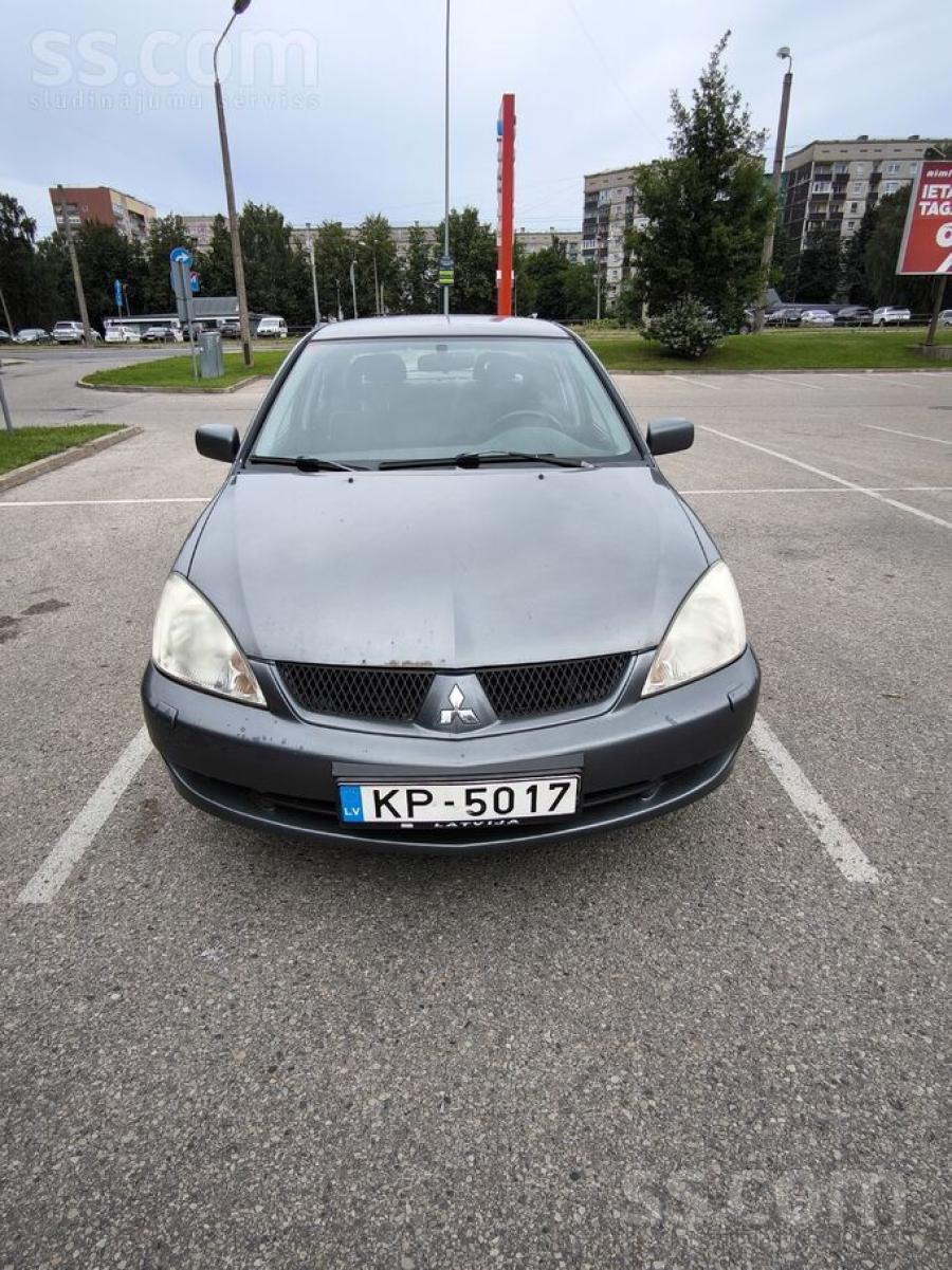 Grey Mitsubishi Lancer 2006 in Riga, with an engine capacity of 1.60 L and mileage of 160 thousand km for 700 €, photo 9 on AUTOMOTO.COM.LV