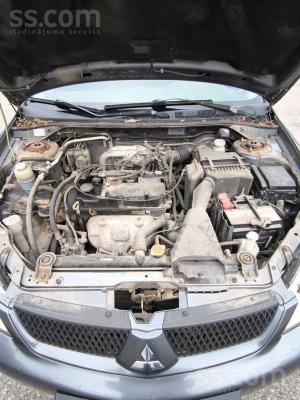 Grey Mitsubishi Lancer 2006 in Riga, with an engine capacity of 1.60 L and mileage of 160 thousand km for 700 €, photo 11 on AUTOMOTO.COM.LV