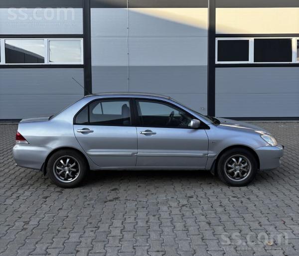 Pelēks Mitsubishi Lancer 2006 Balvi, ar dzinēja tilpumu 1.60 L un nobraukumu 152 tūkst. km par 1350 €, foto 3 vietnē AUTOMOTO.COM.LV