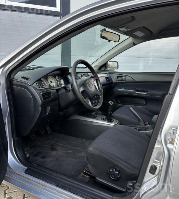 Pelēks Mitsubishi Lancer 2006 Balvi, ar dzinēja tilpumu 1.60 L un nobraukumu 152 tūkst. km par 1350 €, foto 8 vietnē AUTOMOTO.COM.LV