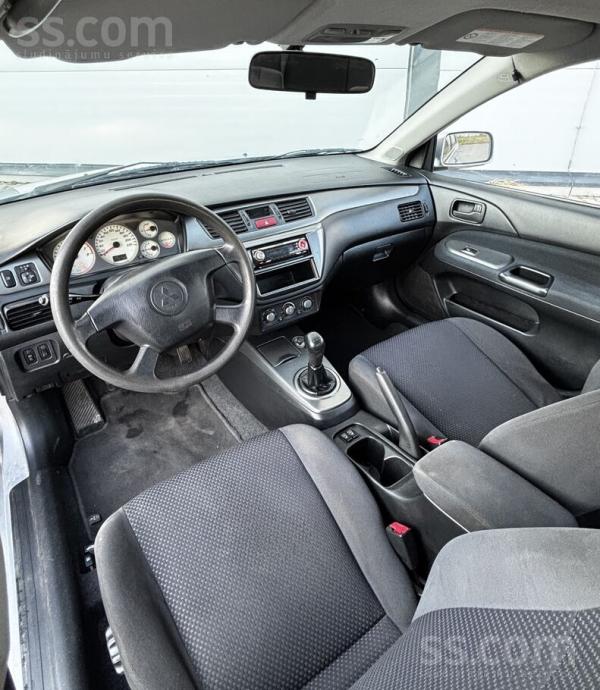 Pelēks Mitsubishi Lancer 2006 Balvi, ar dzinēja tilpumu 1.60 L un nobraukumu 152 tūkst. km par 1350 €, foto 9 vietnē AUTOMOTO.COM.LV