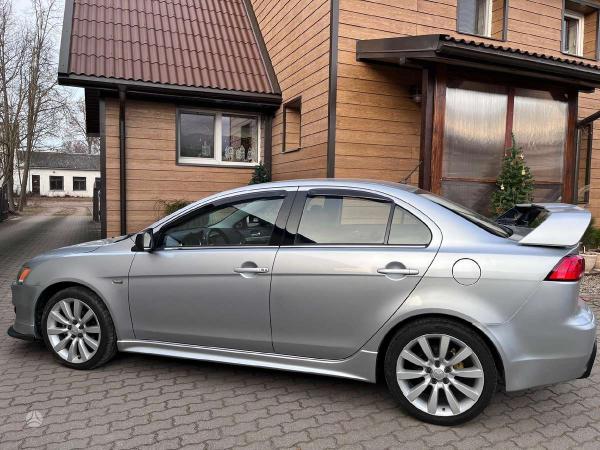 Grey Mitsubishi Lancer 2007 in Marijampole, with an engine capacity of 2.00 L and mileage of 280 thousand km for 5900 €, photo 3 on AUTOMOTO.COM.LV