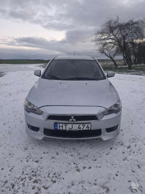 Grey Mitsubishi Lancer 2007 in Jonava, with an engine capacity of 1.97 L and mileage of 363 thousand km for 2800 €, photo 3 on AUTOMOTO.COM.LV