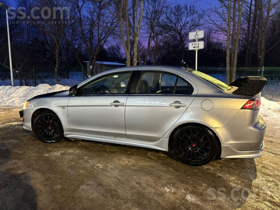 Pelēks Mitsubishi Lancer 2007 Talsi, ar dzinēja tilpumu 1.80 L un nobraukumu 298 tūkst. km par 2800 €, foto 1 vietnē AUTOMOTO.COM.LV