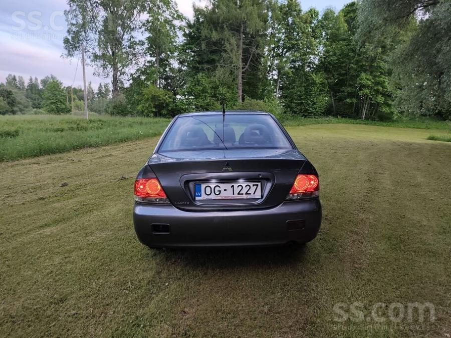 Pelēks Mitsubishi Lancer 2007 Rīga, ar dzinēja tilpumu 1.60 L un nobraukumu 254 tūkst. km par 1400 €, foto 3 vietnē AUTOMOTO.COM.LV