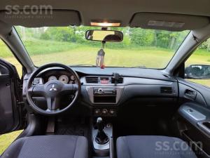 Pelēks Mitsubishi Lancer 2007 Rīga, ar dzinēja tilpumu 1.60 L un nobraukumu 254 tūkst. km par 1400 €, foto 4 vietnē AUTOMOTO.COM.LV