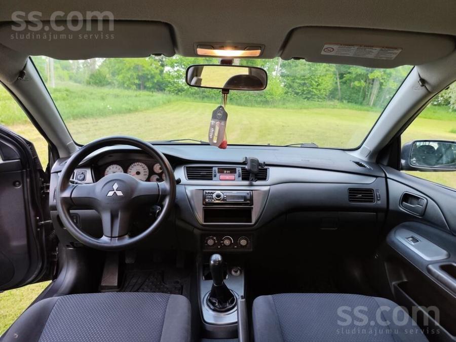 Pelēks Mitsubishi Lancer 2007 Rīga, ar dzinēja tilpumu 1.60 L un nobraukumu 254 tūkst. km par 1400 €, foto 4 vietnē AUTOMOTO.COM.LV