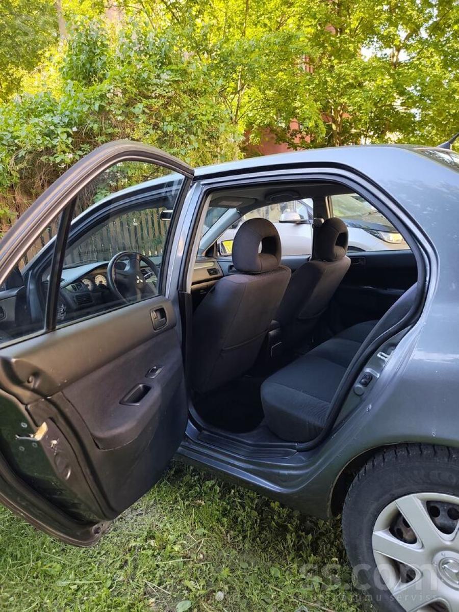 Pelēks Mitsubishi Lancer 2007 Rīga, ar dzinēja tilpumu 1.60 L un nobraukumu 254 tūkst. km par 1400 €, foto 7 vietnē AUTOMOTO.COM.LV