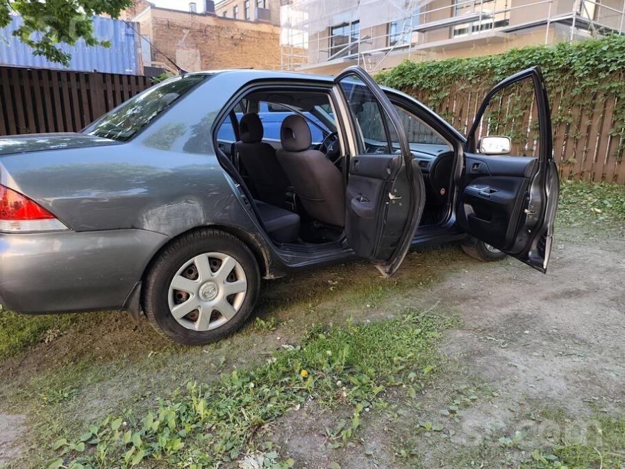 Pelēks Mitsubishi Lancer 2007 Rīga, ar dzinēja tilpumu 1.60 L un nobraukumu 254 tūkst. km par 1400 €, foto 8 vietnē AUTOMOTO.COM.LV