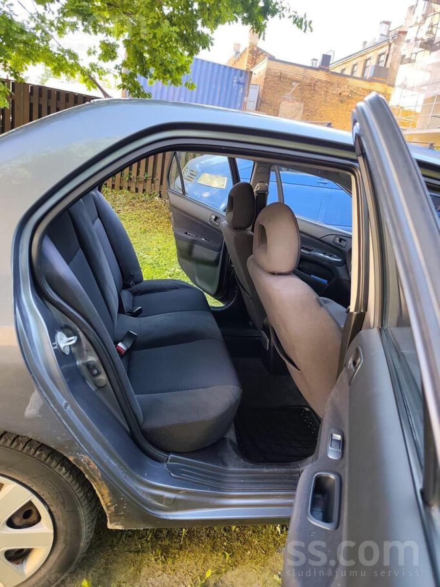 Pelēks Mitsubishi Lancer 2007 Rīga, ar dzinēja tilpumu 1.60 L un nobraukumu 254 tūkst. km par 1400 €, foto 9 vietnē AUTOMOTO.COM.LV