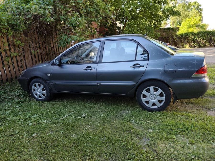 Pelēks Mitsubishi Lancer 2007 Rīga, ar dzinēja tilpumu 1.60 L un nobraukumu 254 tūkst. km par 1400 €, foto 10 vietnē AUTOMOTO.COM.LV