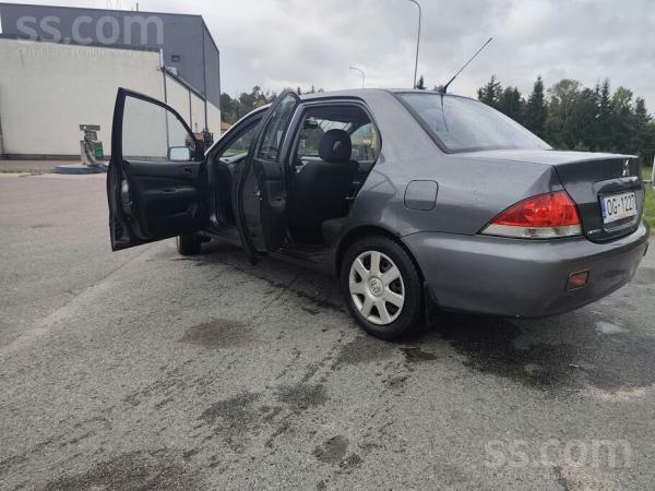 Grey Mitsubishi Lancer 2007 in Riga, with an engine capacity of 1.60 L and mileage of 254 thousand km for 1650 €, photo 7 on AUTOMOTO.COM.LV
