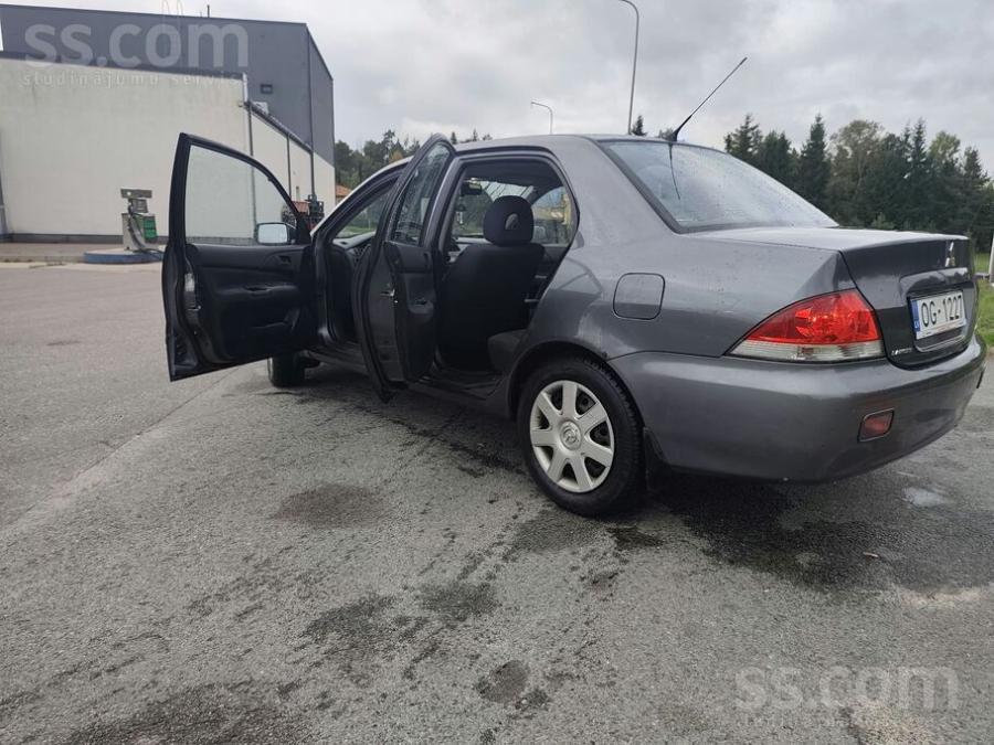 Grey Mitsubishi Lancer 2007 in Riga, with an engine capacity of 1.60 L and mileage of 254 thousand km for 1450 €, photo 7 on AUTOMOTO.COM.LV