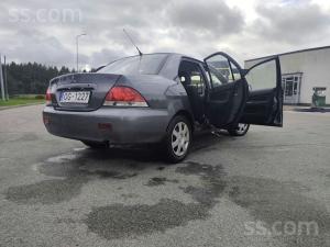 Grey Mitsubishi Lancer 2007 in Riga, with an engine capacity of 1.60 L and mileage of 254 thousand km for 1450 €, photo 8 on AUTOMOTO.COM.LV