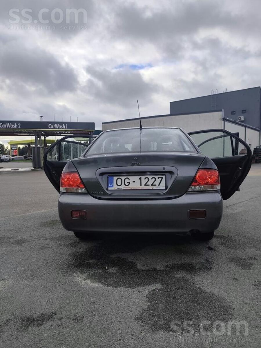 Grey Mitsubishi Lancer 2007 in Riga, with an engine capacity of 1.60 L and mileage of 254 thousand km for 1450 €, photo 12 on AUTOMOTO.COM.LV