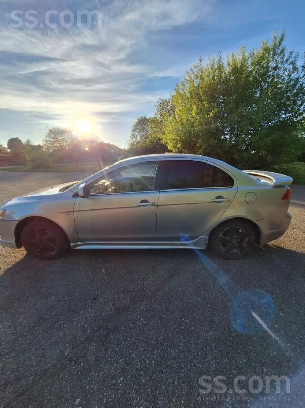 Grey Mitsubishi Lancer 2007 in Kuldiga, with an engine capacity of 2.00 L and mileage of 310 thousand km for 1695 €, photo 6 on AUTOMOTO.COM.LV