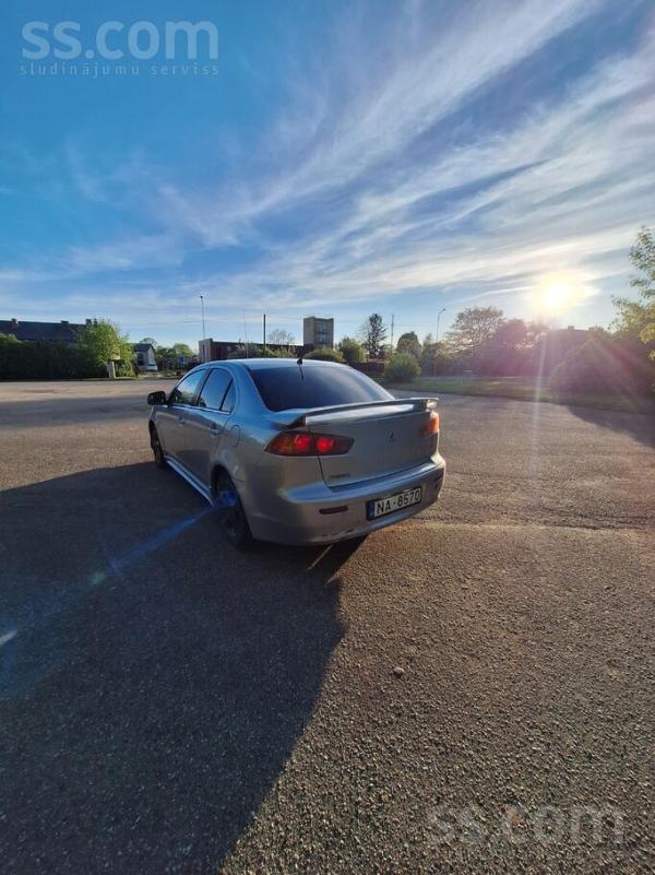 Grey Mitsubishi Lancer 2007 in Kuldiga, with an engine capacity of 2.00 L and mileage of 310 thousand km for 1695 €, photo 7 on AUTOMOTO.COM.LV