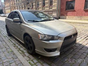 Pelēks Mitsubishi Lancer 2007 Rīga, ar dzinēja tilpumu 2.00 L un nobraukumu 275 tūkst. km par 1280 €, foto  vietnē AUTOMOTO.COM.LV