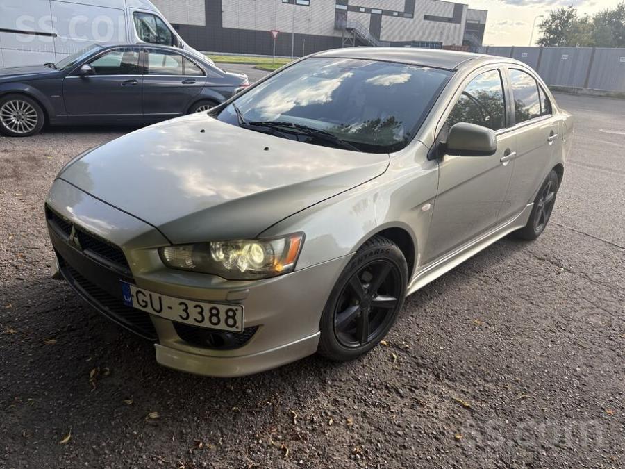 Pelēks Mitsubishi Lancer 2007 Rīga, ar dzinēja tilpumu 2.00 L un nobraukumu 275 tūkst. km par 1280 €, foto 5 vietnē AUTOMOTO.COM.LV