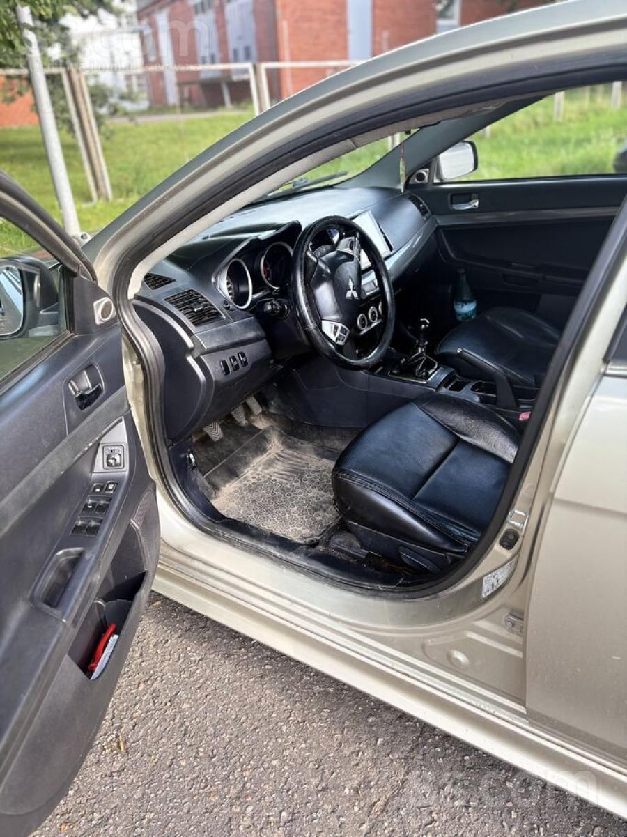 Pelēks Mitsubishi Lancer 2007 Rīga, ar dzinēja tilpumu 2.00 L un nobraukumu 275 tūkst. km par 1280 €, foto 8 vietnē AUTOMOTO.COM.LV