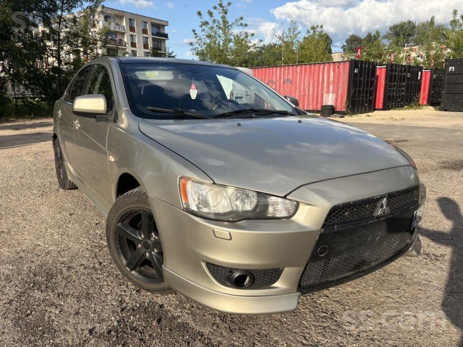 Pelēks Mitsubishi Lancer 2007 Rīga, ar dzinēja tilpumu 2.00 L un nobraukumu 275 tūkst. km par 1280 €, foto 9 vietnē AUTOMOTO.COM.LV