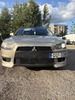 Pelēks Mitsubishi Lancer 2007 Rīga, ar dzinēja tilpumu 2.00 L un nobraukumu 275 tūkst. km par 1280 €, foto 10 vietnē AUTOMOTO.COM.LV