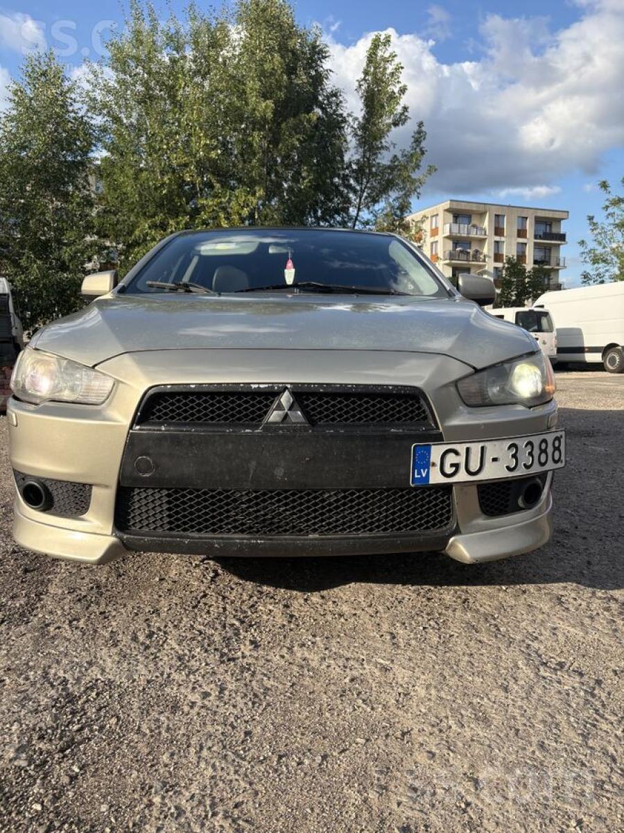 Pelēks Mitsubishi Lancer 2007 Rīga, ar dzinēja tilpumu 2.00 L un nobraukumu 275 tūkst. km par 1280 €, foto 10 vietnē AUTOMOTO.COM.LV