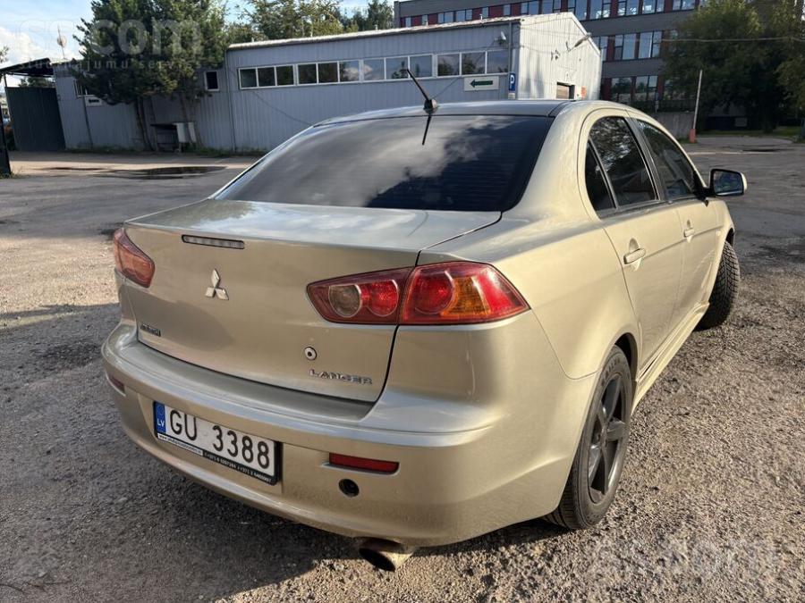 Pelēks Mitsubishi Lancer 2007 Rīga, ar dzinēja tilpumu 2.00 L un nobraukumu 275 tūkst. km par 1280 €, foto 11 vietnē AUTOMOTO.COM.LV