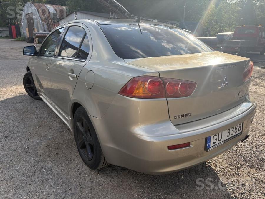 Pelēks Mitsubishi Lancer 2007 Rīga, ar dzinēja tilpumu 2.00 L un nobraukumu 275 tūkst. km par 1280 €, foto 12 vietnē AUTOMOTO.COM.LV