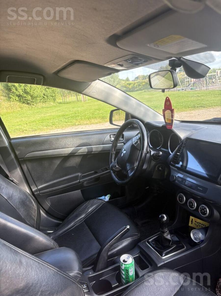 Pelēks Mitsubishi Lancer 2007 Rīga, ar dzinēja tilpumu 2.00 L un nobraukumu 275 tūkst. km par 1280 €, foto 16 vietnē AUTOMOTO.COM.LV