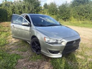 Pelēks Mitsubishi Lancer 2007 Rīga, ar dzinēja tilpumu 2.00 L un nobraukumu 275 tūkst. km par 1280 €, foto 17 vietnē AUTOMOTO.COM.LV