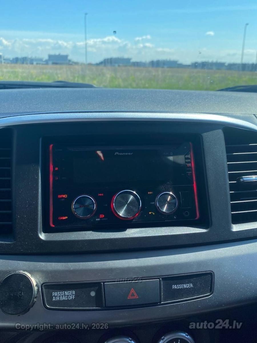 Pelēks Mitsubishi Lancer 2007 Tallina, ar dzinēja tilpumu 1.50 L un nobraukumu 215 tūkst. km par 1489 €, foto 9 vietnē AUTOMOTO.COM.LV