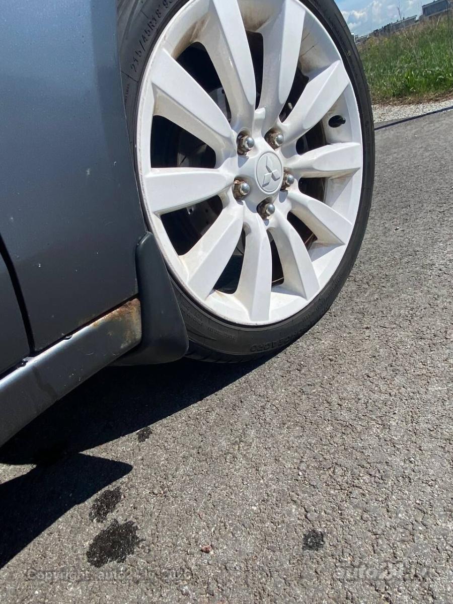 Pelēks Mitsubishi Lancer 2007 Tallina, ar dzinēja tilpumu 1.50 L un nobraukumu 215 tūkst. km par 1489 €, foto 11 vietnē AUTOMOTO.COM.LV