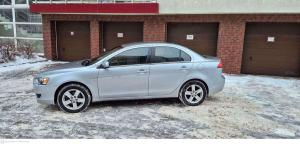 Grey Mitsubishi Lancer 2008 in Vilnius, with an engine capacity of 1.58 L and mileage of 313 thousand km for 2600 €, photo 4 on AUTOMOTO.COM.LV