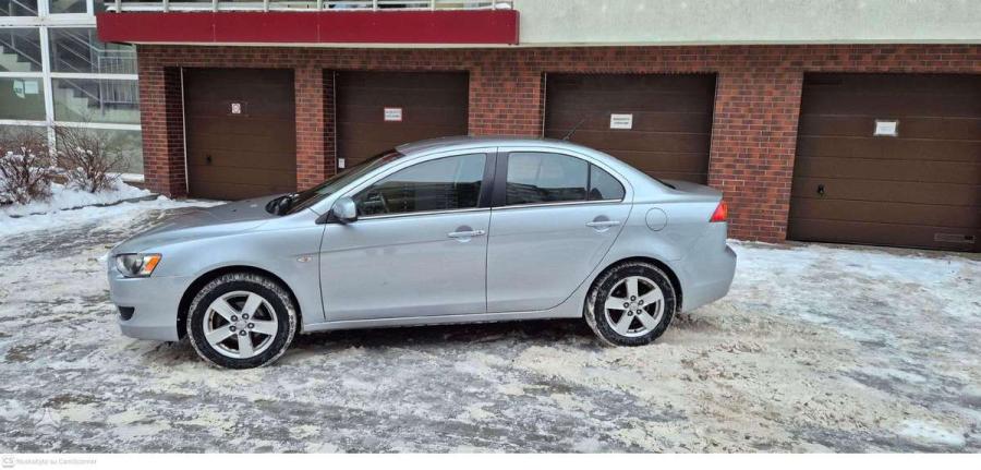 Grey Mitsubishi Lancer 2008 in Vilnius, with an engine capacity of 1.58 L and mileage of 313 thousand km for 2600 €, photo 4 on AUTOMOTO.COM.LV