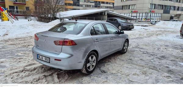 Grey Mitsubishi Lancer 2008 in Vilnius, with an engine capacity of 1.50 L and mileage of 313 thousand km for 2600 €, photo 6 on AUTOMOTO.COM.LV