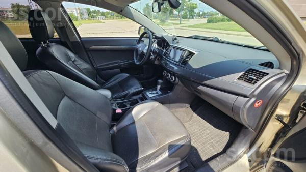 Grey Mitsubishi Lancer 2008 in Riga, with an engine capacity of 1.80 L and mileage of 240 thousand km for 2300 €, photo 9 on AUTOMOTO.COM.LV