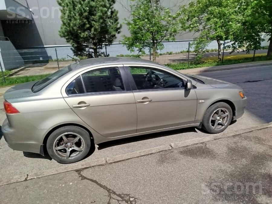 Pelēks Mitsubishi Lancer 2008 Rīga, ar dzinēja tilpumu 1.80 L un nobraukumu 118 tūkst. km par 2500 €, foto 1 vietnē AUTOMOTO.COM.LV