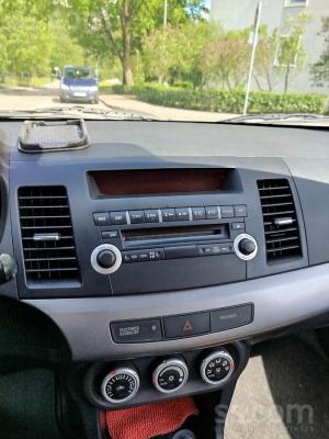 Pelēks Mitsubishi Lancer 2008 Rīga, ar dzinēja tilpumu 1.80 L un nobraukumu 118 tūkst. km par 2500 €, foto 7 vietnē AUTOMOTO.COM.LV