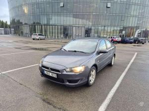 Pelēks Mitsubishi Lancer 2008 Pakruojis, ar dzinēja tilpumu 1.97 L un nobraukumu 235 tūkst. km par 1850 €, foto  vietnē AUTOMOTO.COM.LV