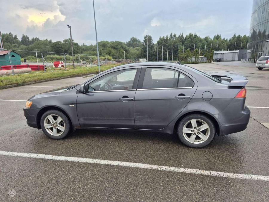 Grey Mitsubishi Lancer 2008 in Pakruojis, with an engine capacity of 1.97 L and mileage of 235 thousand km for 1850 €, photo 3 on AUTOMOTO.COM.LV