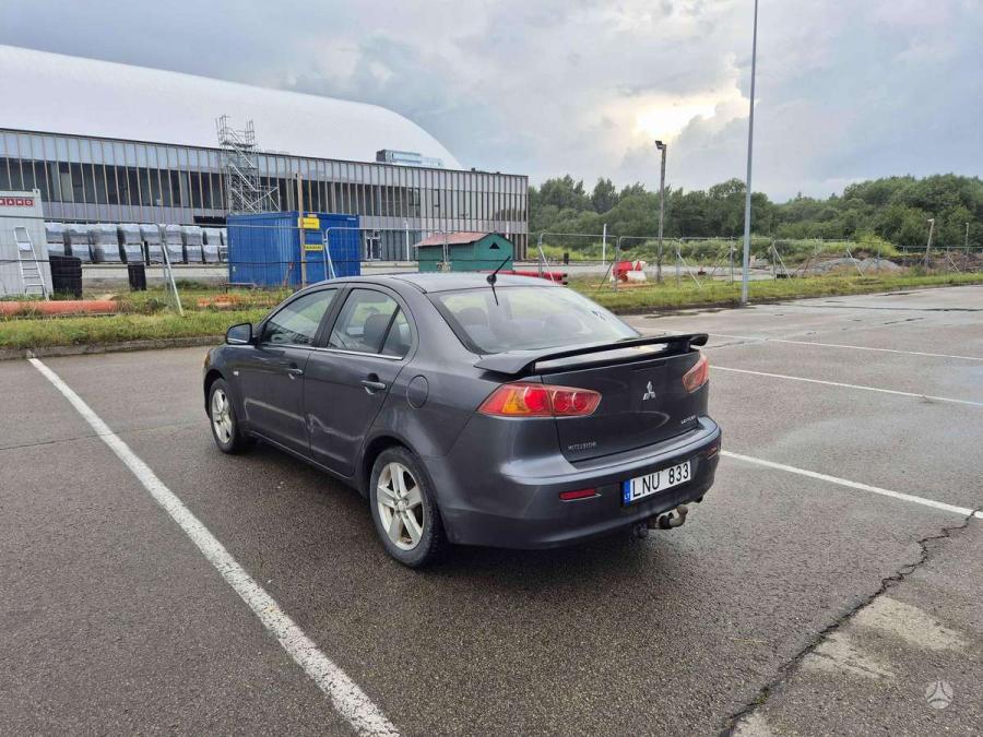 Grey Mitsubishi Lancer 2008 in Pakruojis, with an engine capacity of 1.97 L and mileage of 235 thousand km for 1850 €, photo 4 on AUTOMOTO.COM.LV