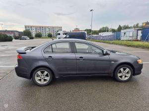 Grey Mitsubishi Lancer 2008 in Pakruojis, with an engine capacity of 1.97 L and mileage of 235 thousand km for 1850 €, photo 6 on AUTOMOTO.COM.LV