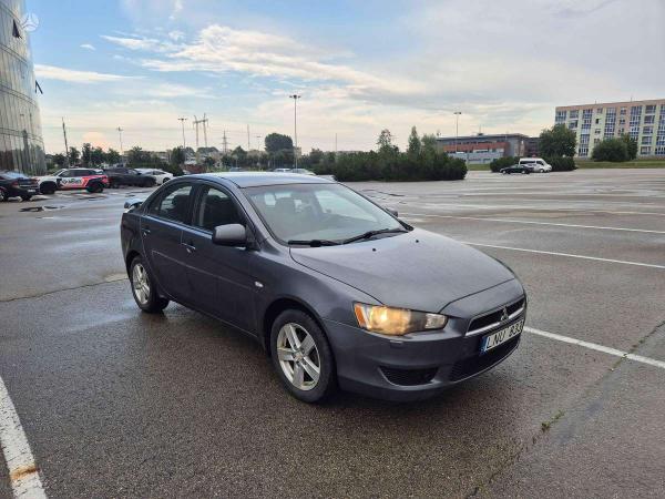 Pelēks Mitsubishi Lancer 2008 Pakruojis, ar dzinēja tilpumu 1.97 L un nobraukumu 235 tūkst. km par 1850 €, foto 6 vietnē AUTOMOTO.COM.LV