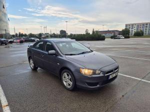 Grey Mitsubishi Lancer 2008 in Pakruojis, with an engine capacity of 1.97 L and mileage of 235 thousand km for 1850 €, photo 7 on AUTOMOTO.COM.LV