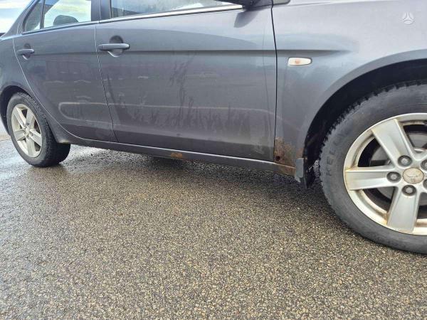 Pelēks Mitsubishi Lancer 2008 Pakruojis, ar dzinēja tilpumu 1.97 L un nobraukumu 235 tūkst. km par 1850 €, foto 7 vietnē AUTOMOTO.COM.LV
