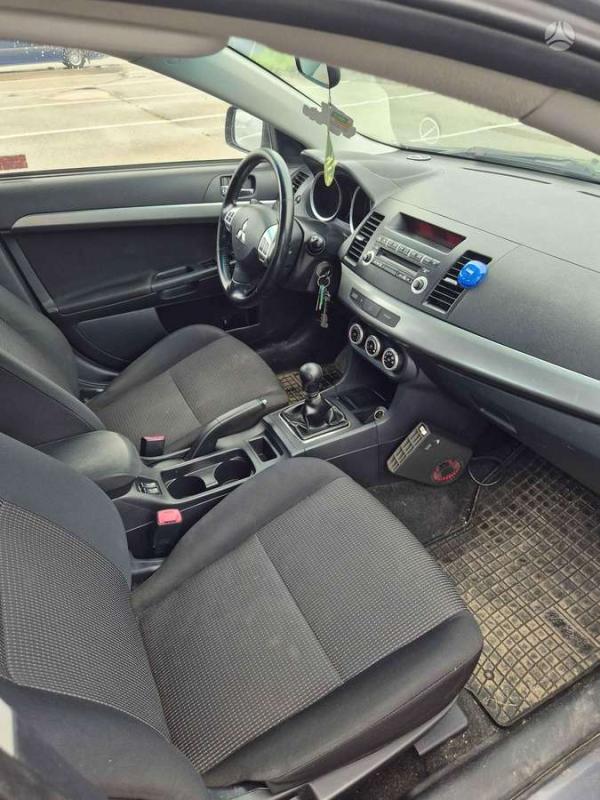 Pelēks Mitsubishi Lancer 2008 Pakruojis, ar dzinēja tilpumu 1.97 L un nobraukumu 235 tūkst. km par 1850 €, foto 8 vietnē AUTOMOTO.COM.LV