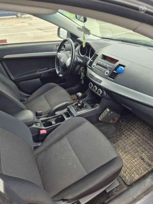 Grey Mitsubishi Lancer 2008 in Pakruojis, with an engine capacity of 1.97 L and mileage of 235 thousand km for 1850 €, photo 9 on AUTOMOTO.COM.LV